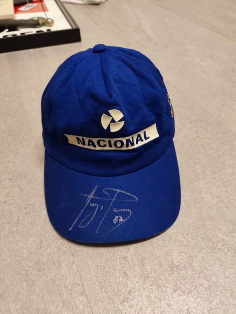 1987 Ayrton Senna personal "Nacional" cap signed – Formula 1 Memorabilia